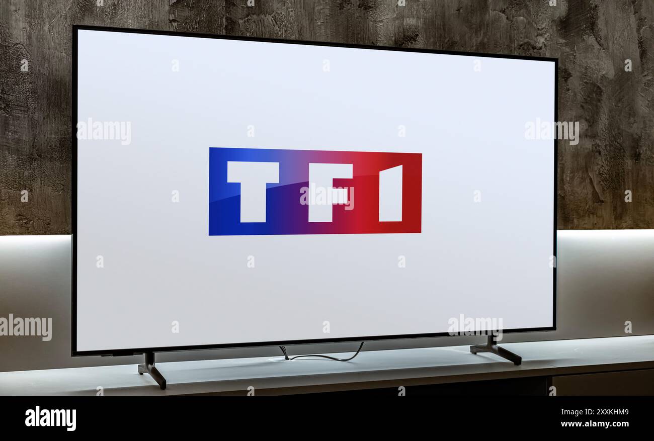 POZNAN, POL - DEC 19, 2023: Flat-screen TV set displaying logo of TF1 ...