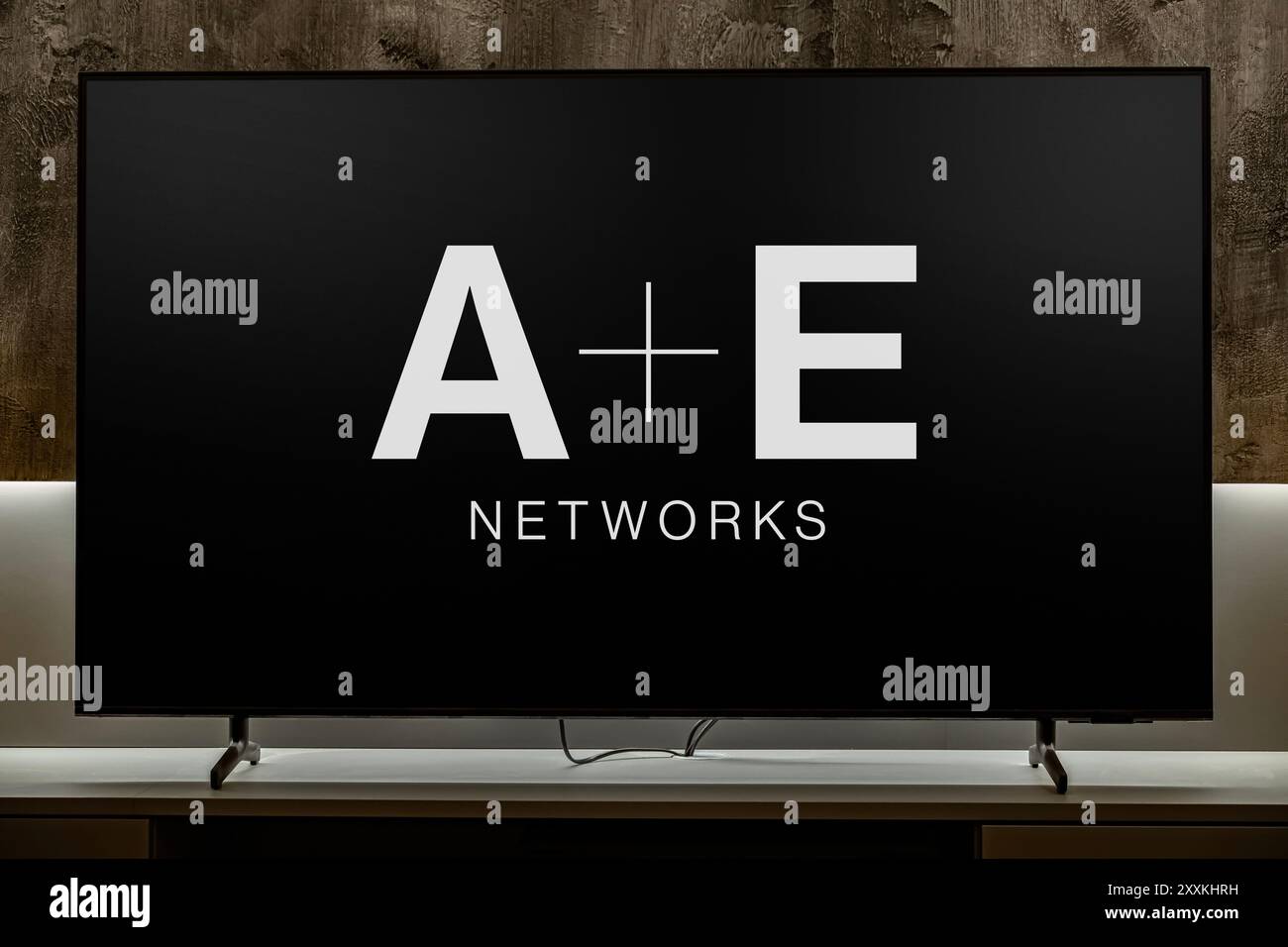 POZNAN, POL - FEB 04, 2020: Flat-screen TV set displaying logo of A&E ...