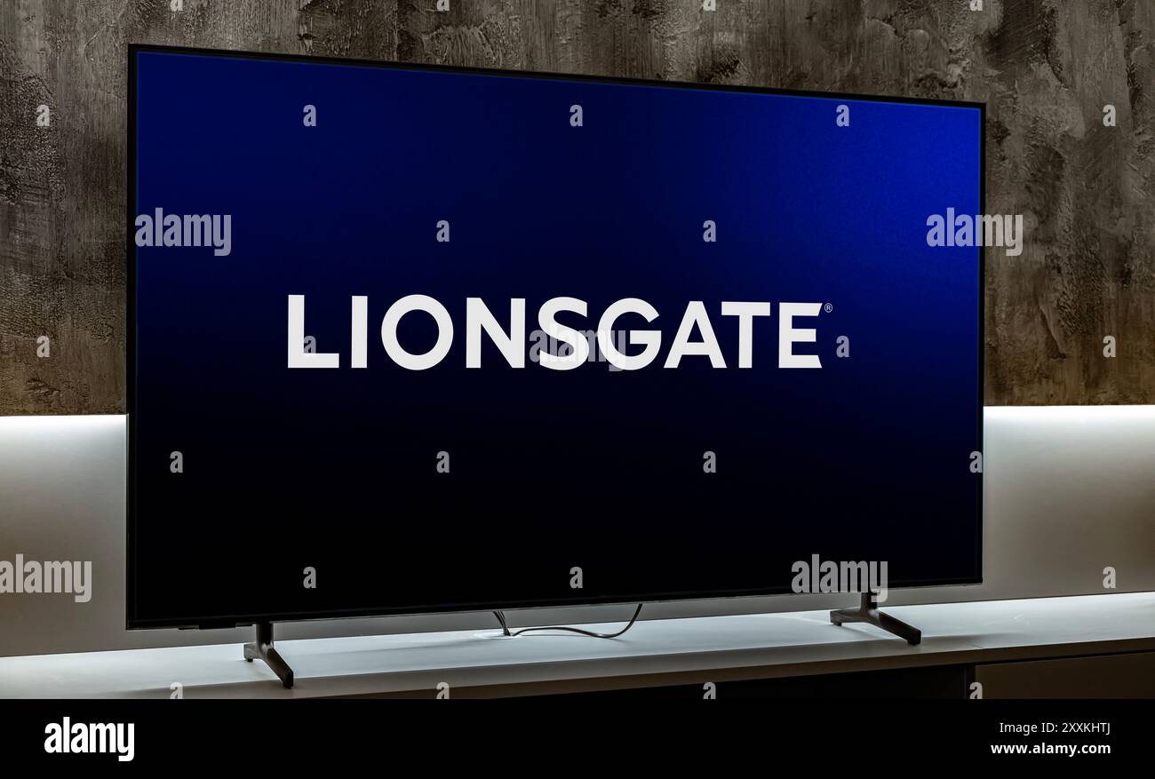 POZNAN, POL - DEC 19, 2023: Flat-screen TV set displaying logo of Lionsgate, an American ...