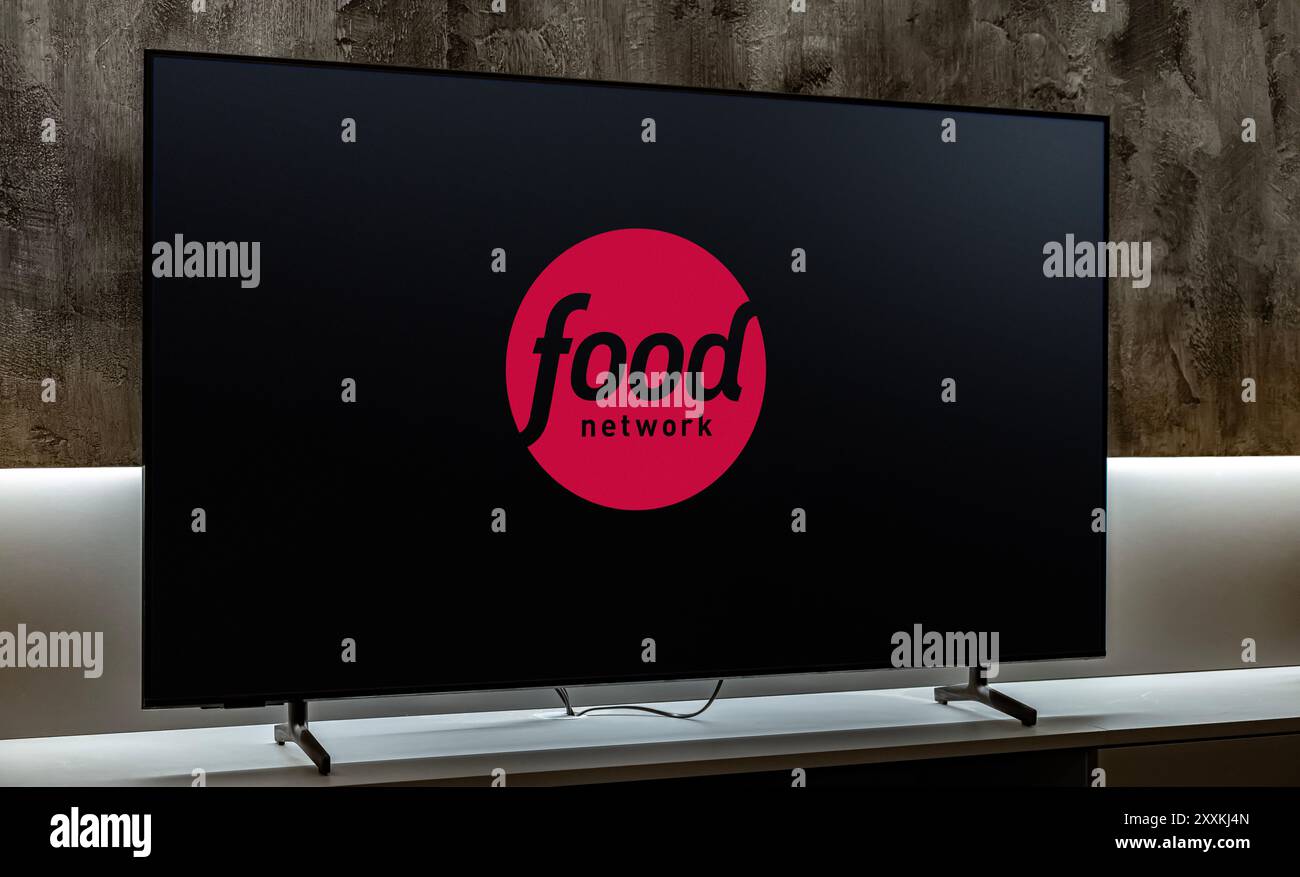 POZNAN, POL - MAR 01, 2024: Flat-screen TV set displaying logo of Food ...