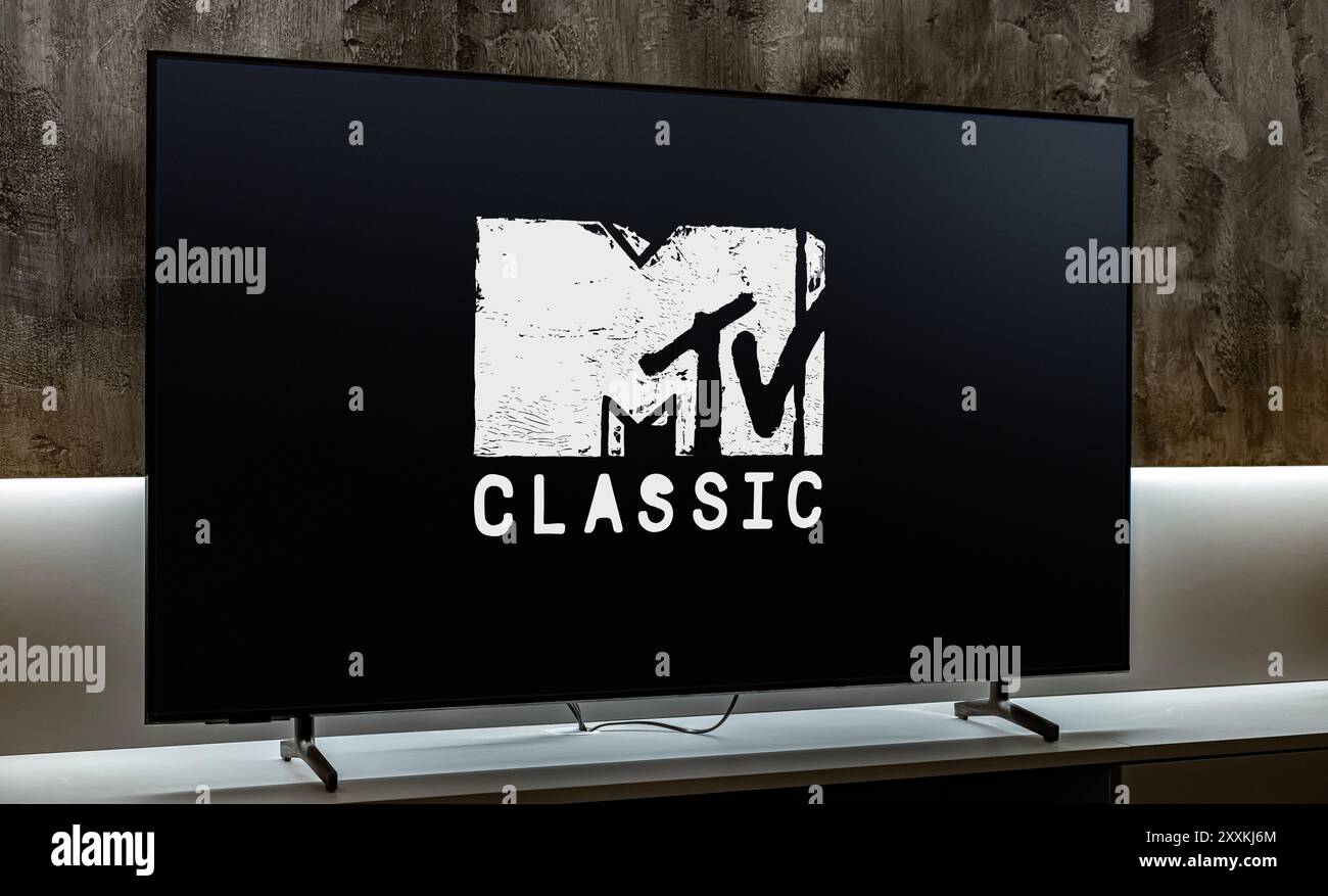 POZNAN, POL - MAR 01, 2024: Flat-screen TV set displaying logo of MTV ...