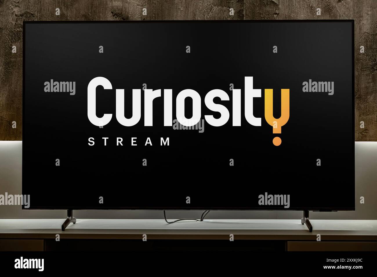 POZNAN, POL - MAY 06, 2024: Flat-screen TV set displaying logo of ...