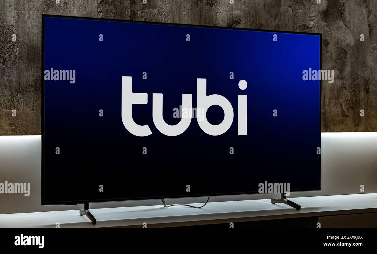 POZNAN, POL - MAR 01, 2024: Flat-screen TV set displaying logo of Tubi ...