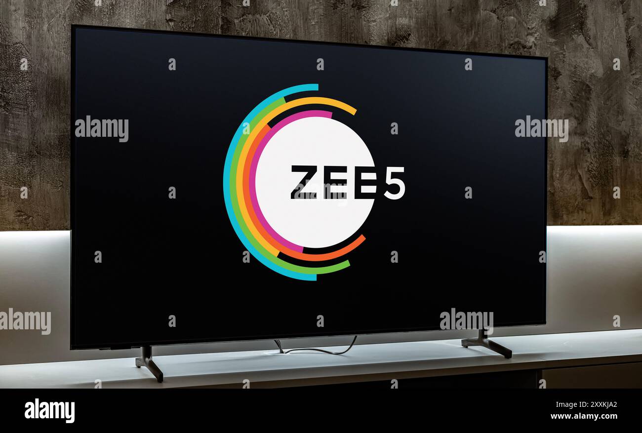 POZNAN, POL - MAY 06, 2024: Flat-screen TV set displaying logo of ZEE5 ...
