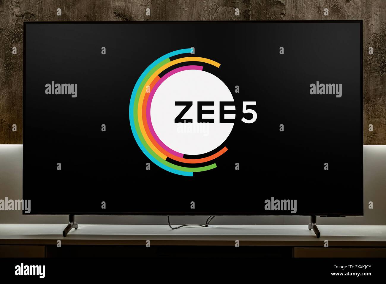 POZNAN, POL - MAY 06, 2024: Flat-screen TV set displaying logo of ZEE5 ...