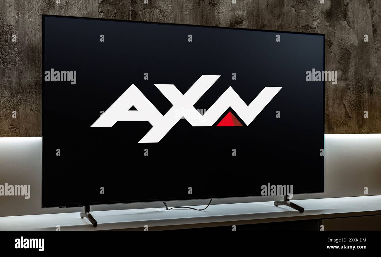 POZNAN, POL - APR 10, 2024: Flat-screen TV set displaying logo of AXN ...
