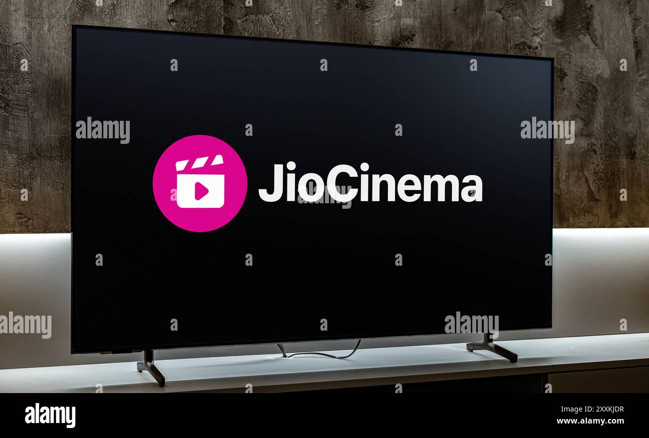 POZNAN, POL - MAY 06, 2024: Flat-screen TV set displaying logo of ...