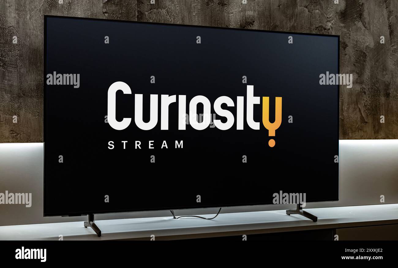 POZNAN, POL - MAY 06, 2024: Flat-screen TV set displaying logo of ...