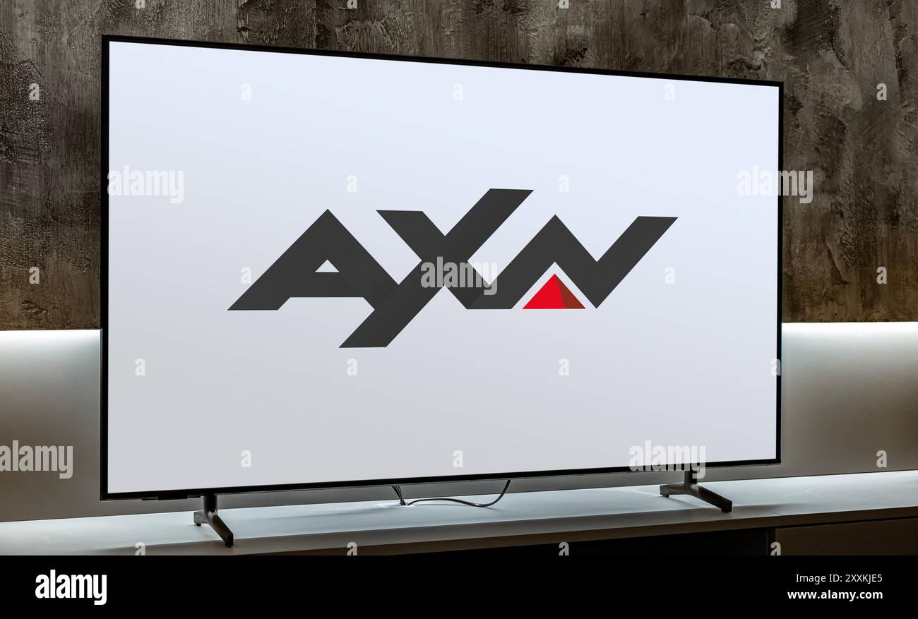 POZNAN, POL - APR 10, 2024: Flat-screen TV set displaying logo of AXN ...