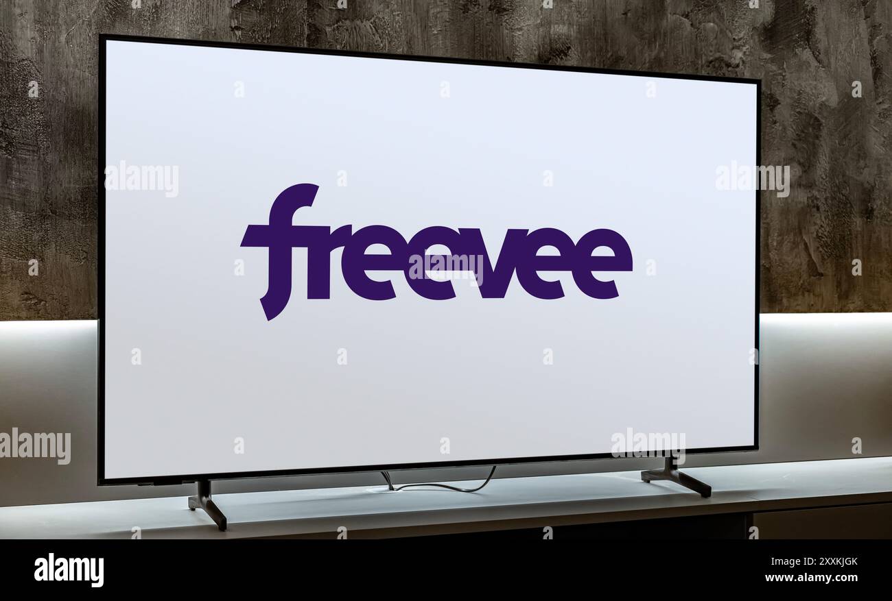 POZNAN, POL - JUL 31, 2024: Flat-screen TV set displaying logo of ...