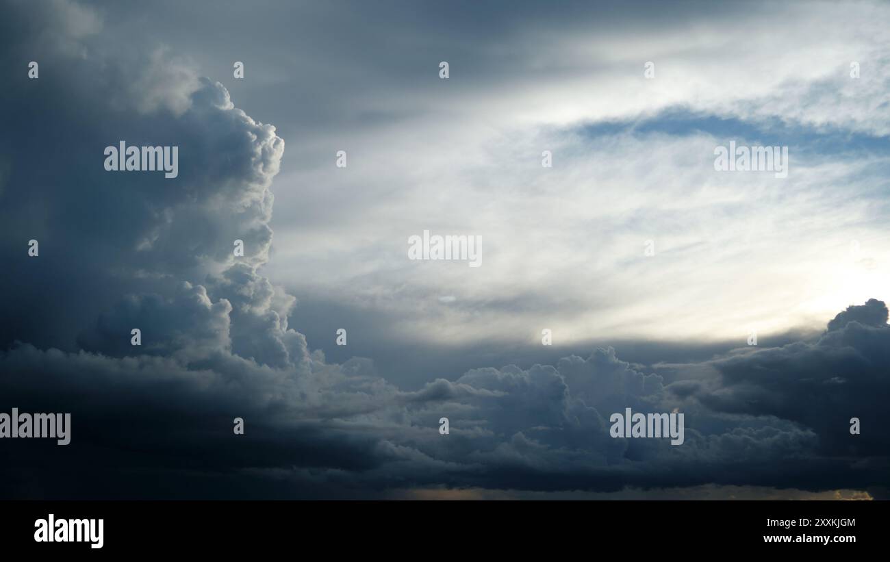 Dramatic cloudy sky with dark and light clouds. Outdoor nature ...