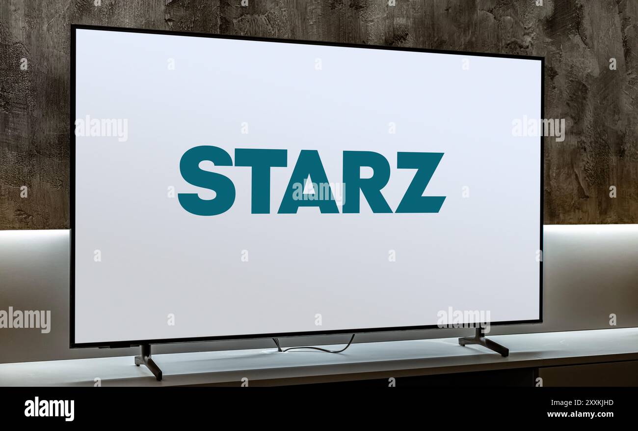 POZNAN, POL - MAY 06, 2024: Flat-screen TV set displaying logo of Starz ...