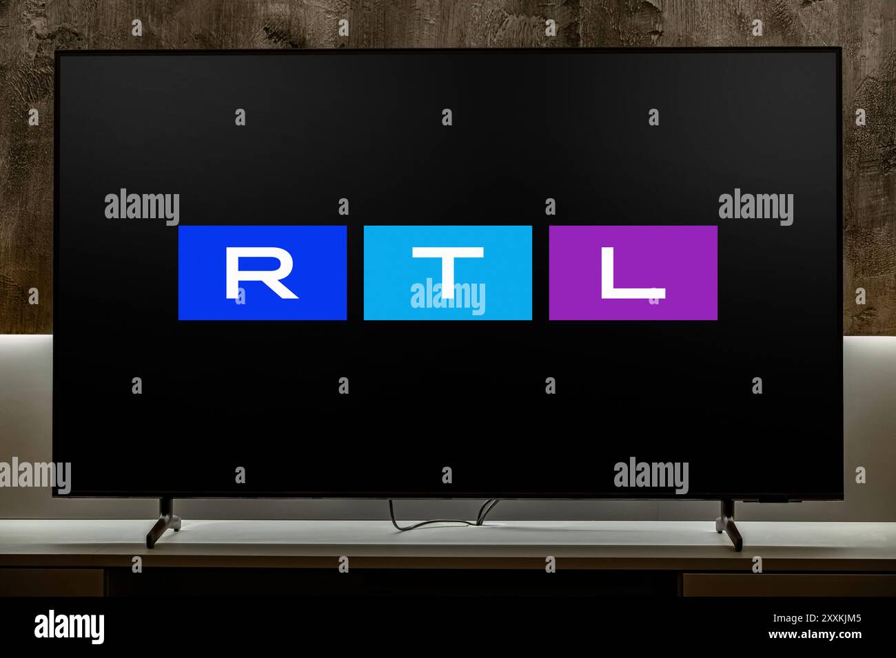 POZNAN, POL - JUL 31, 2024: Flat-screen TV set displaying logo of RTL ...