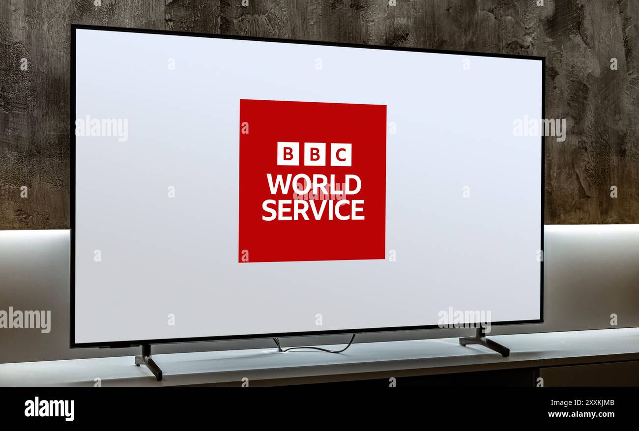 POZNAN, POL - JUL 31, 2024: Flat-screen TV set displaying logo of BBC ...