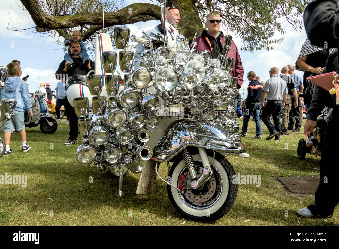 A scooter customised with many mirrors at the Isle of Wight, United ...