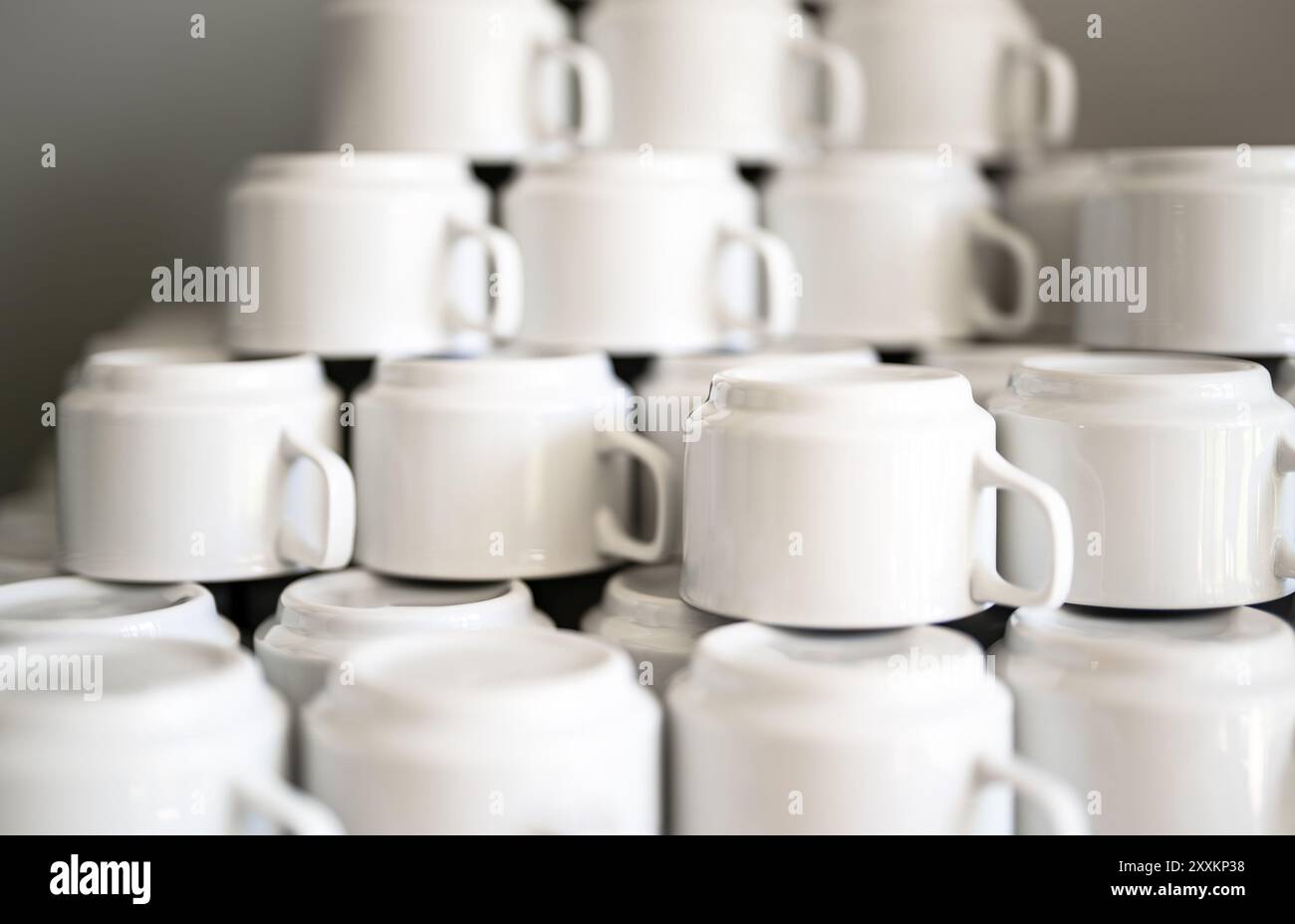 Lots of empty tea or coffee mugs Stock Photo - Alamy