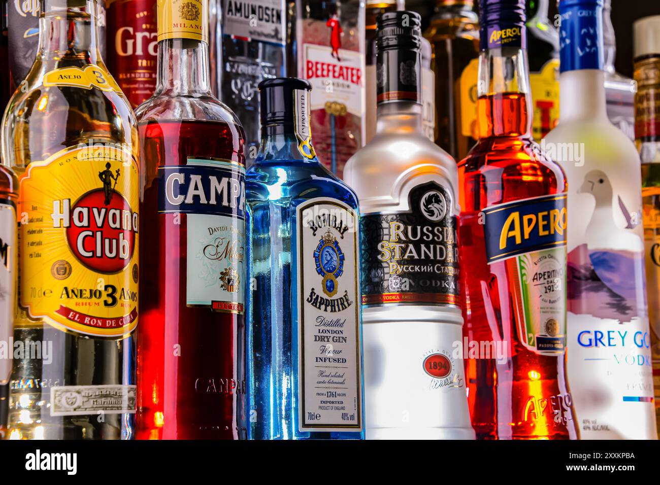 POZNAN, POL - NOV 29, 2023: Bottles of assorted global hard liquor ...