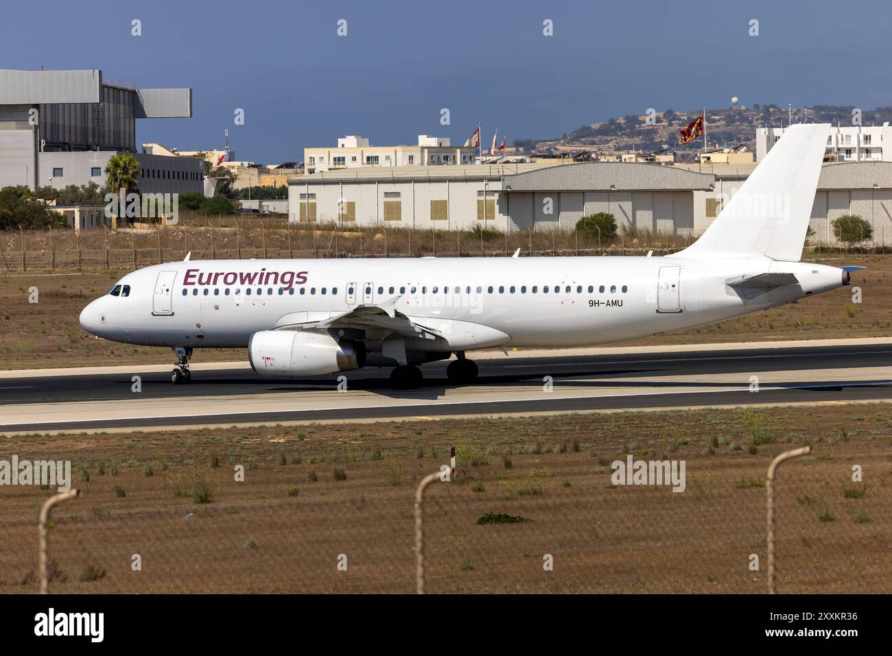 Eurowings (Avion Express Malta) Airbus A320-232 (REG: 9H-AMU) exiting ...