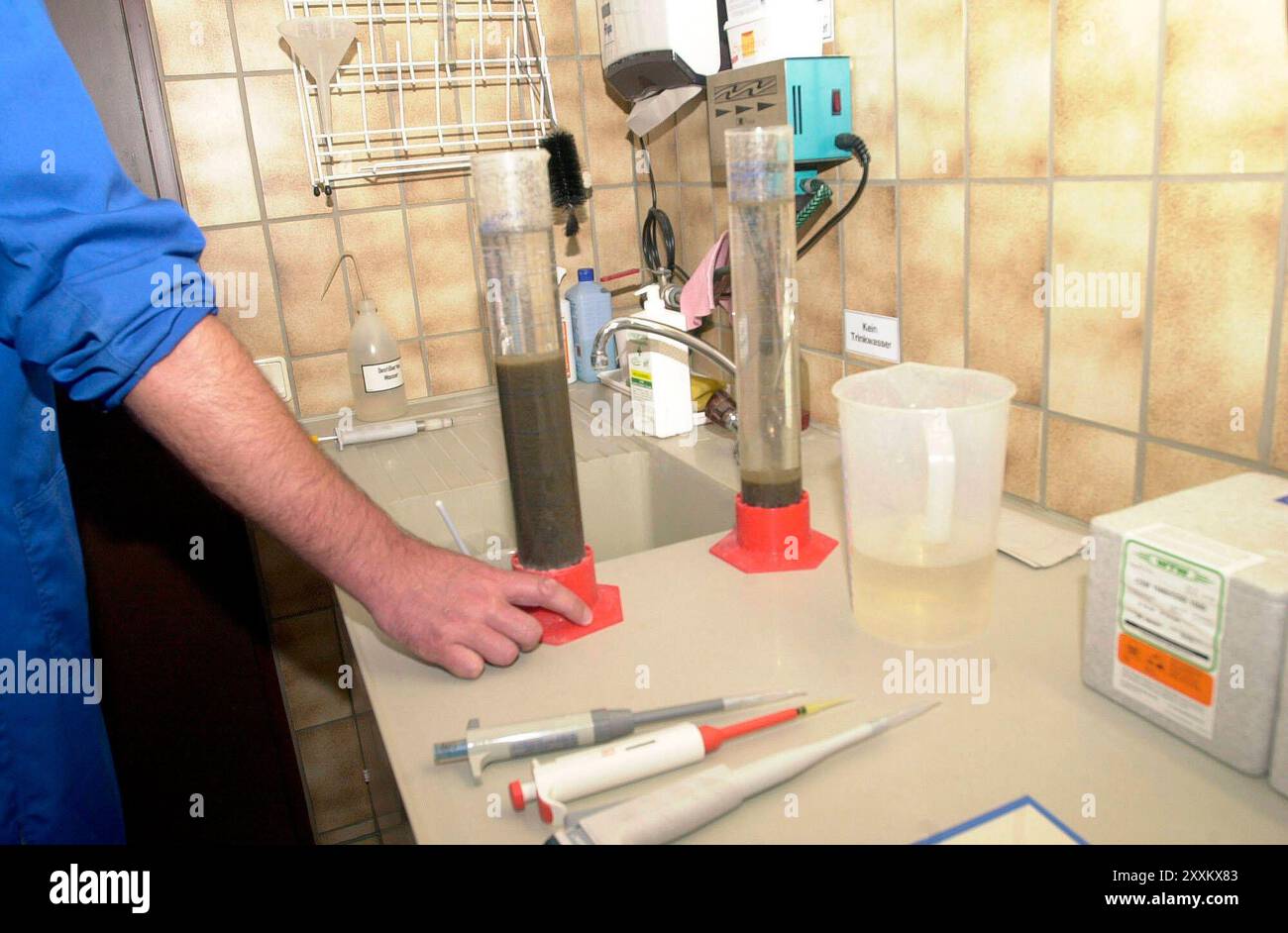 taking a sample to measure and analyse the water quality taking sample ...