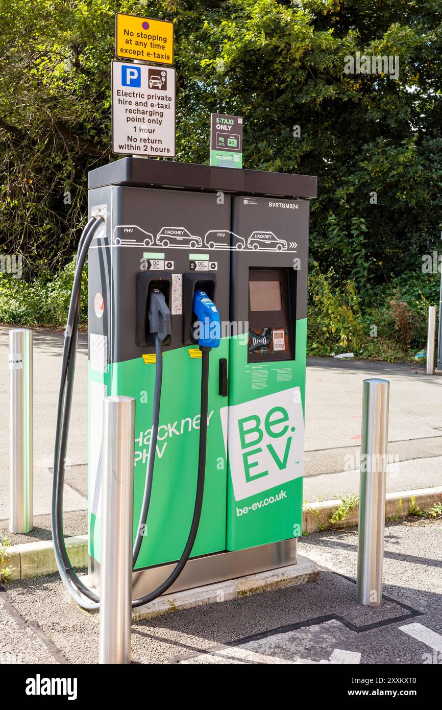 Salford, Greater Manchester, UK. August, 24, 2024: Modern electric vehicle charging station in a ...