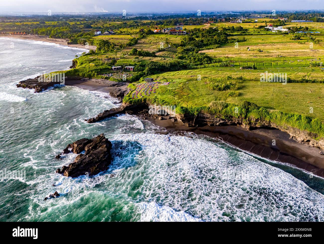 Cliff sea coast near Tanah Lot, Bali, Indonesia Stock Photo - Alamy
