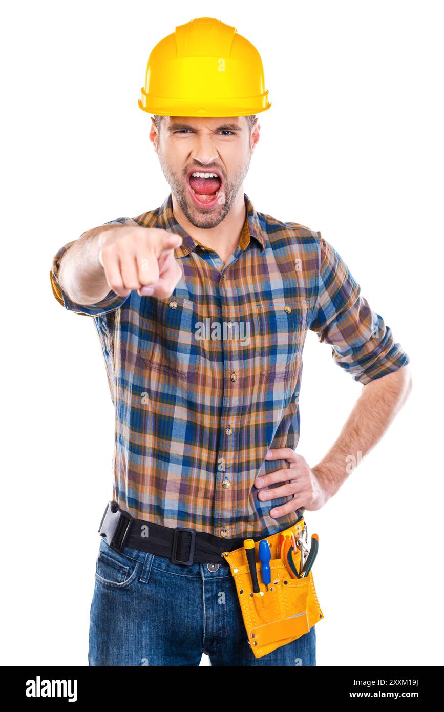 Angry contractor. Furious young male carpenter pointing you and ...
