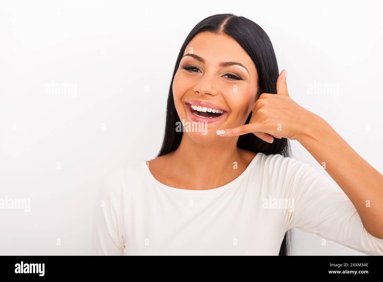 Casual woman call hand sign hi-res stock photography and images - Alamy