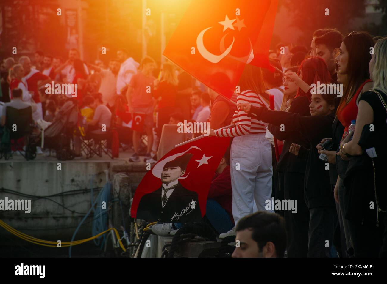 Istanbul: People celebrating in Bosphorus. People wave Turkish flags ...
