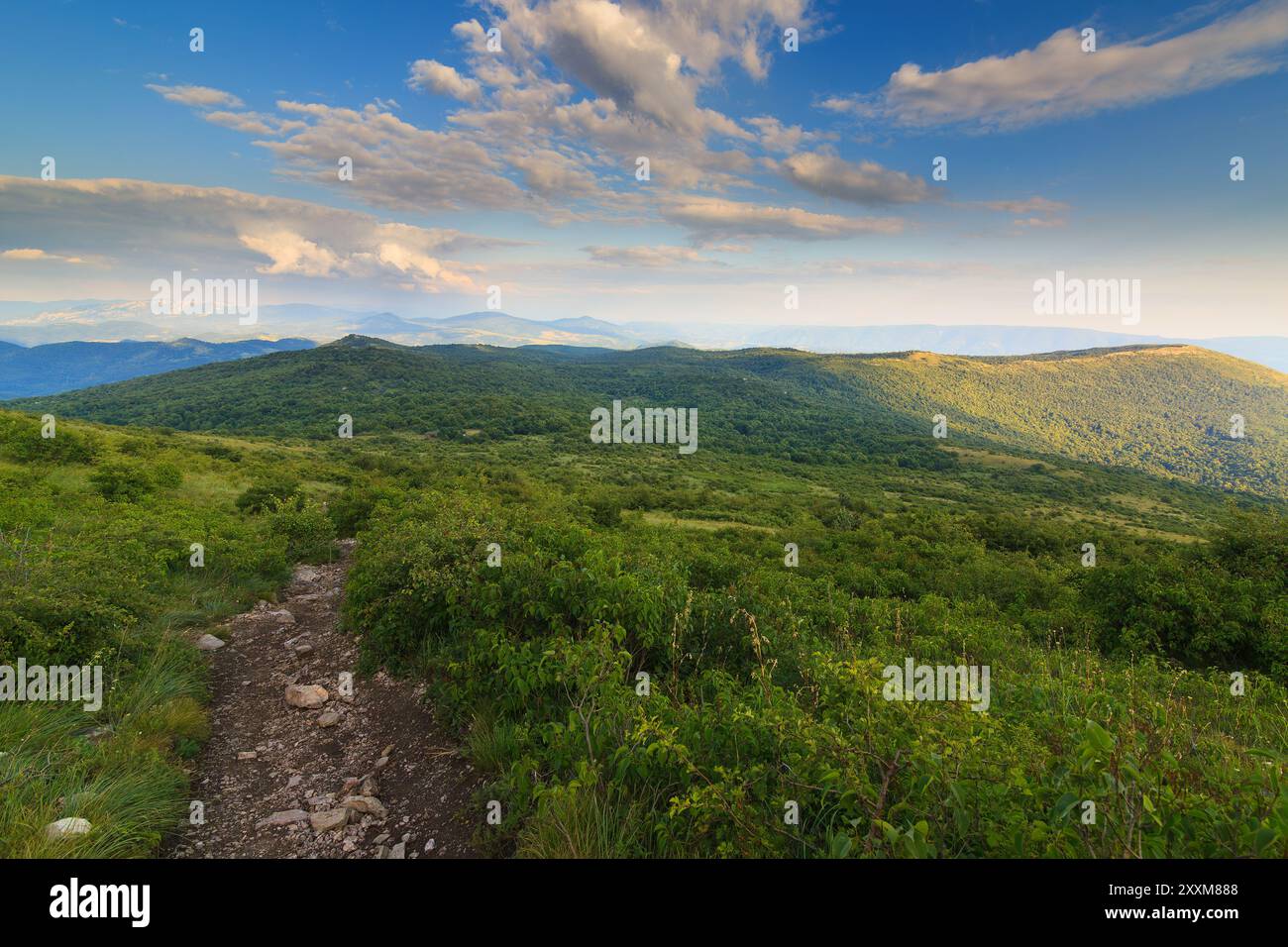 This image depicts a panoramic view of the hilly landscape from the ...