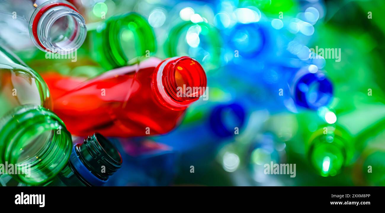 Empty colored drink bottles. Recyclable plastic waste Stock Photo - Alamy
