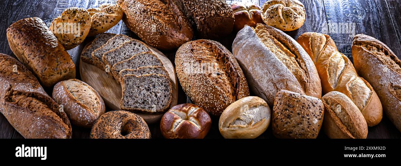 Assorted bakery products including loaves of bread and rolls Stock ...