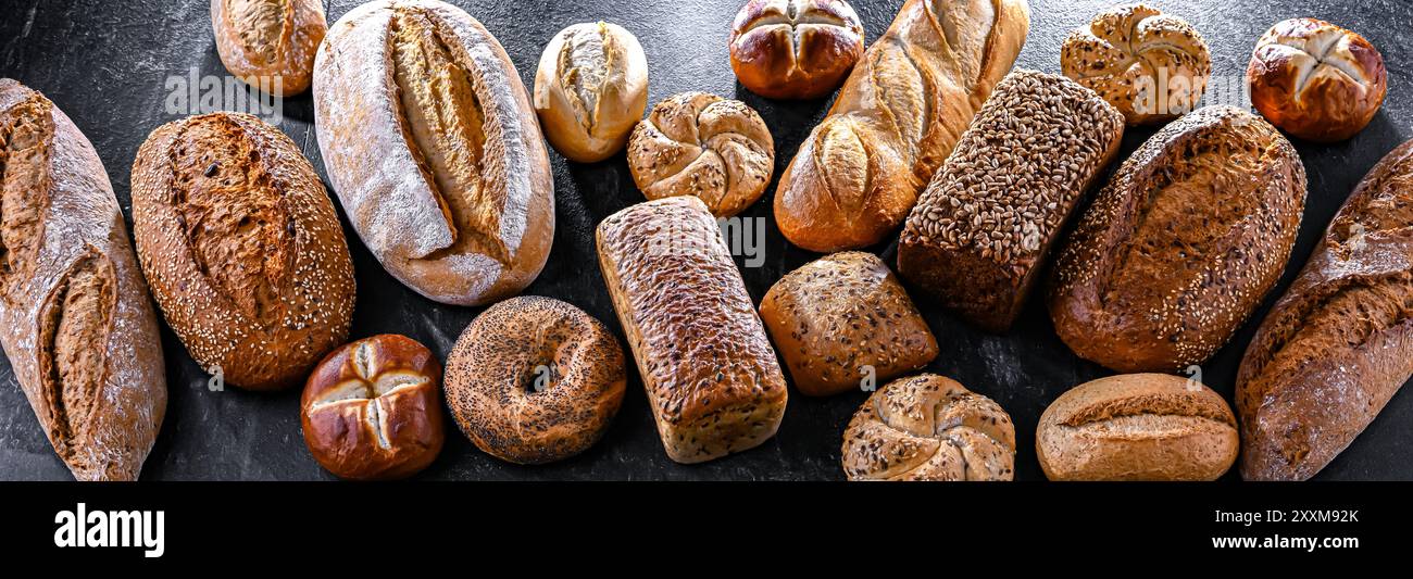 Assorted bakery products including loaves of bread and rolls Stock ...