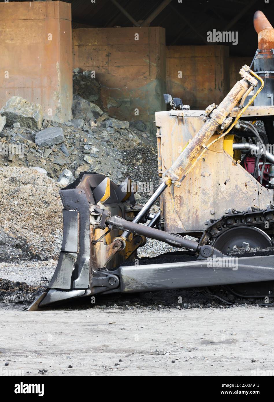 Bulldozer machine doing earth moving work in construction site Stock ...