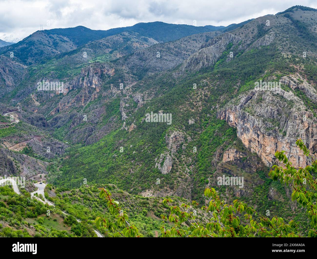 mountain landscape with road near Karaca Cave, in Gumushane Province ...
