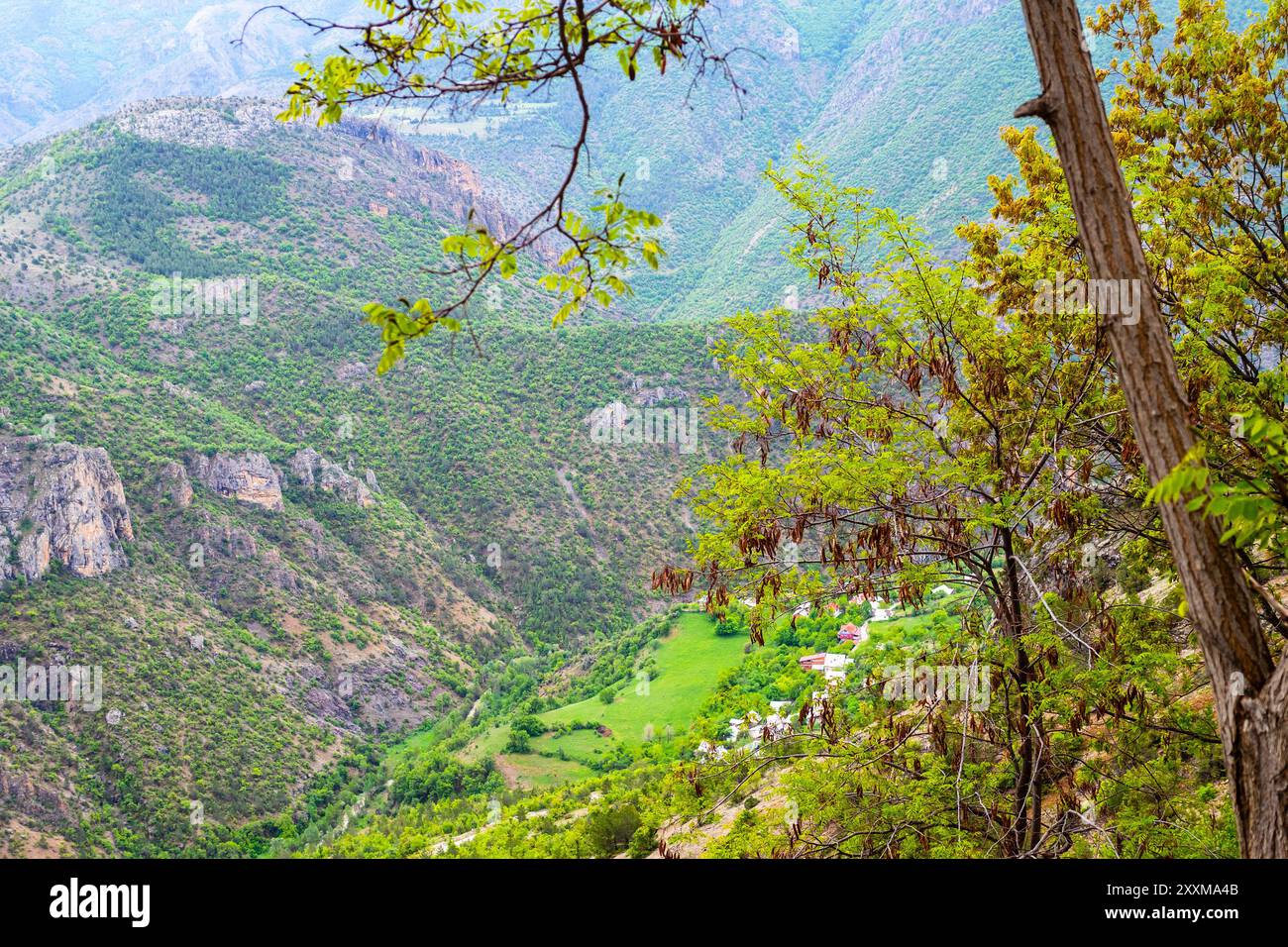 above view of mountain valley with village near Karaca Cave, in ...