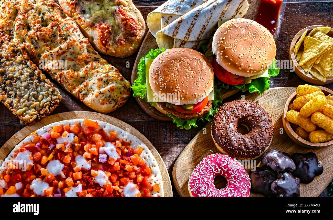 Foods enhancing the risk of cancer. Junk food Stock Photo - Alamy
