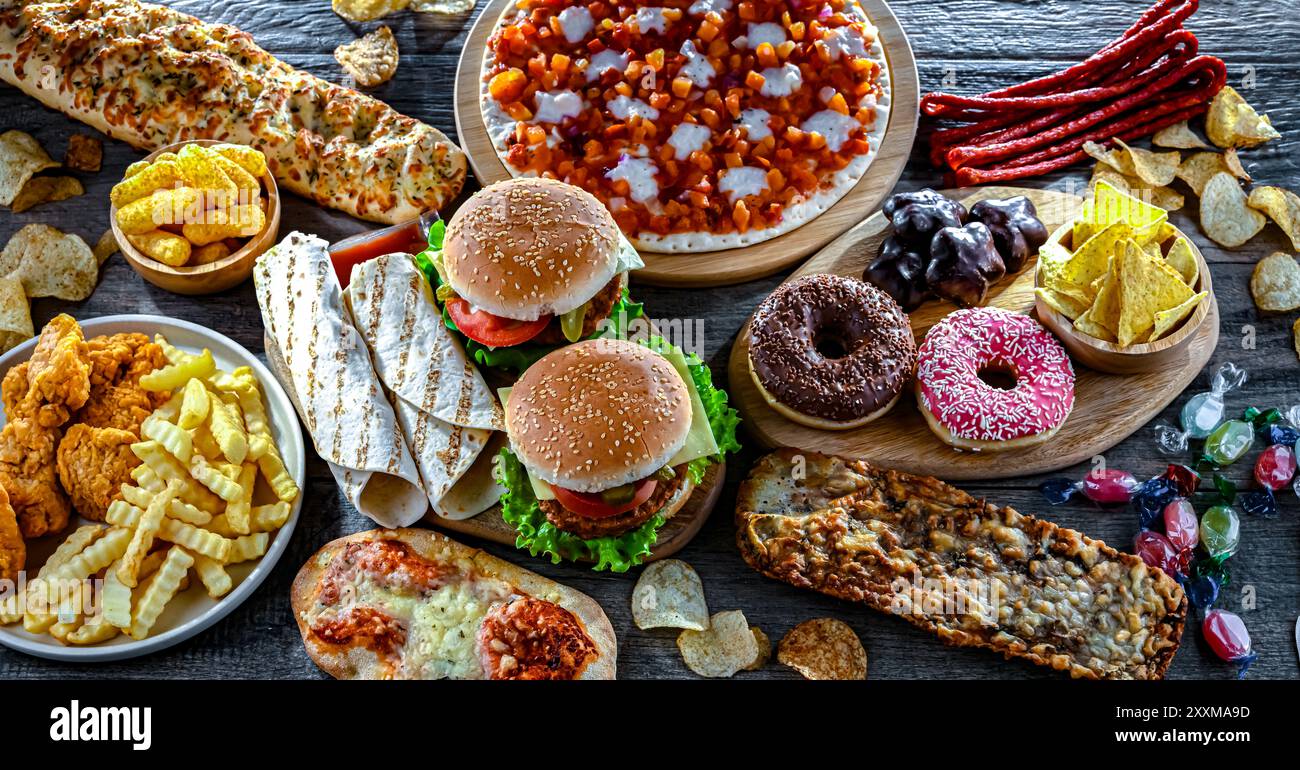 Foods enhancing the risk of cancer. Junk food Stock Photo - Alamy