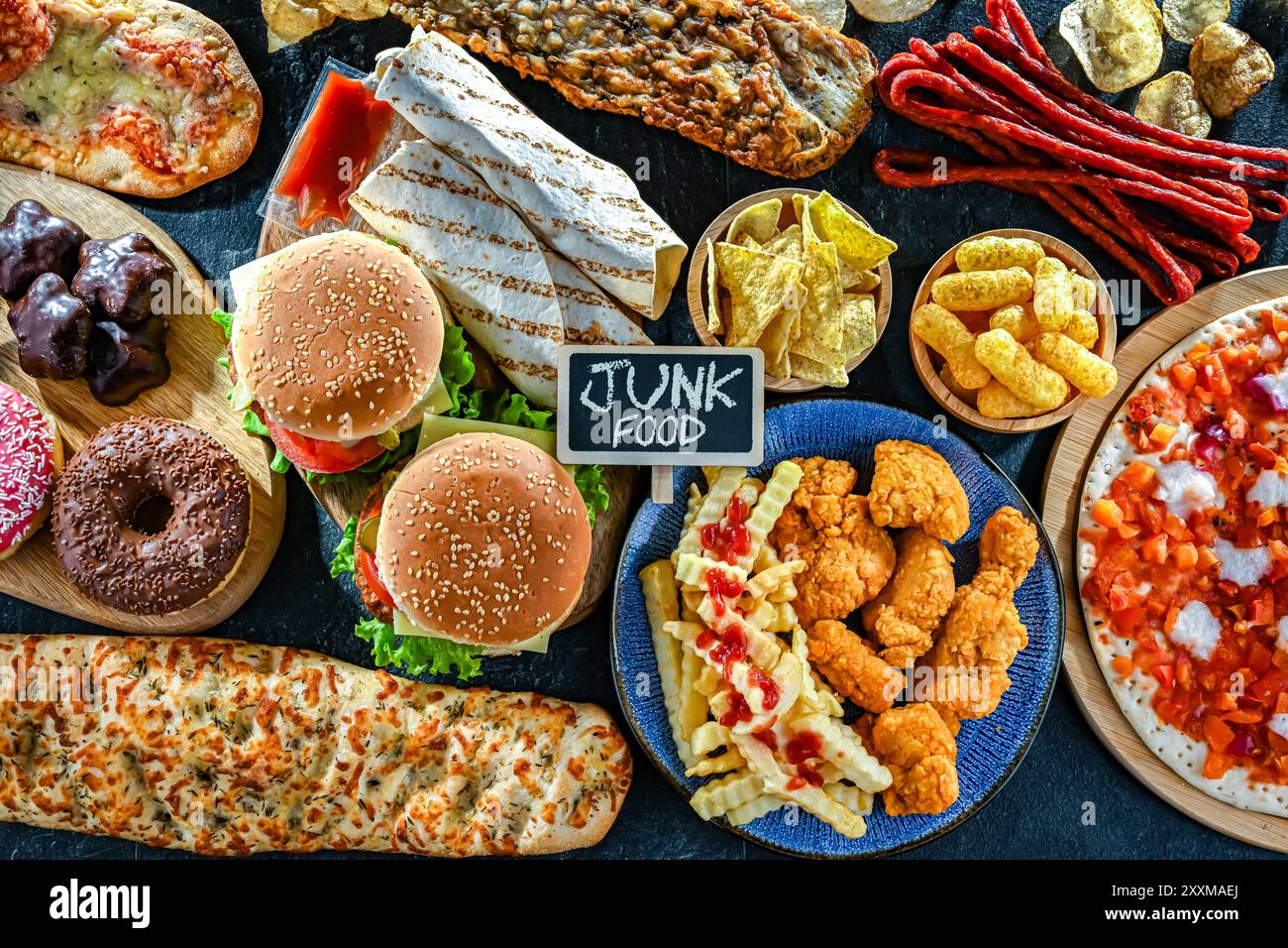 Foods enhancing the risk of cancer. Junk food Stock Photo - Alamy