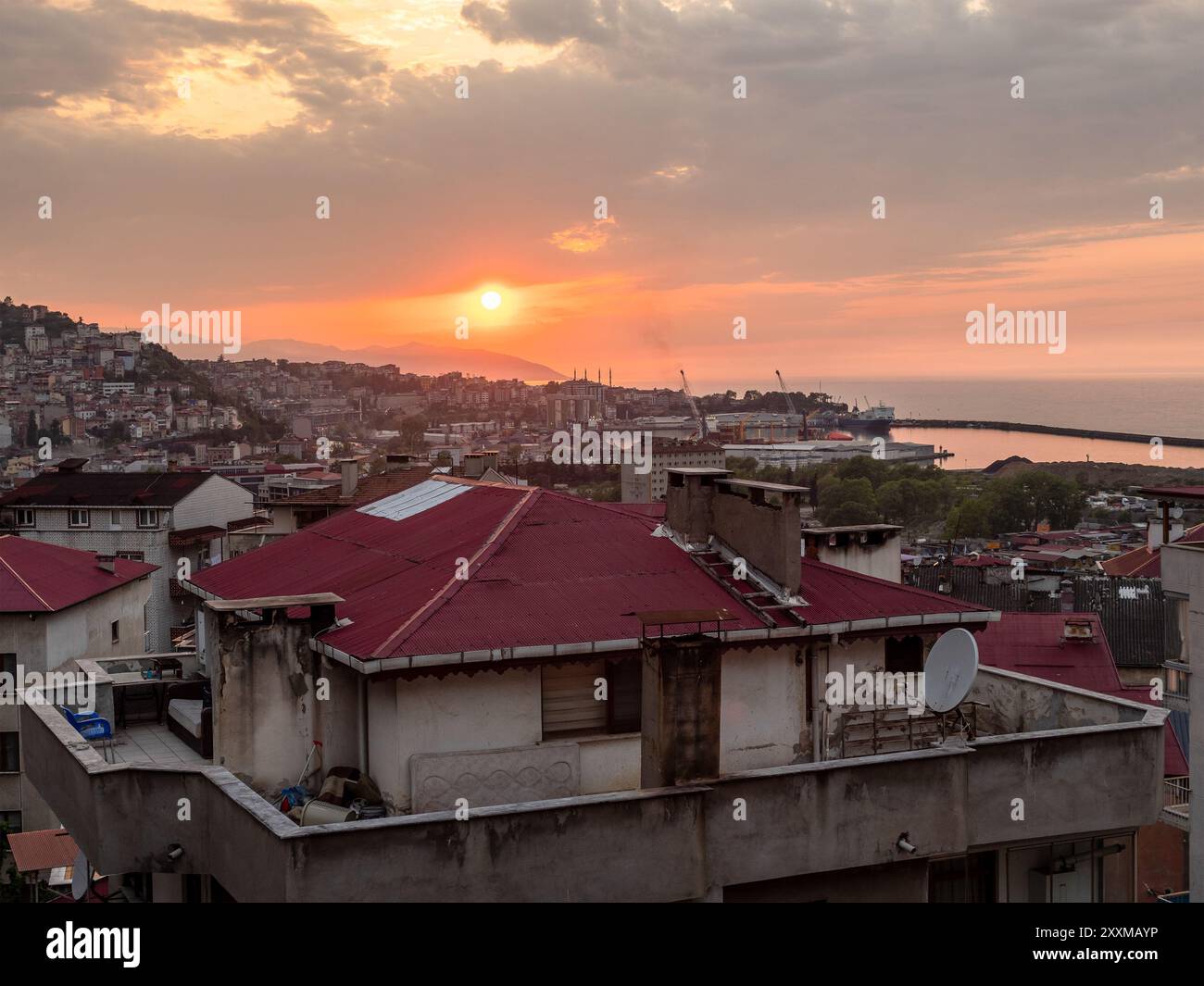 setting sun over Ortahisar district of Trabzon city in spring evening ...