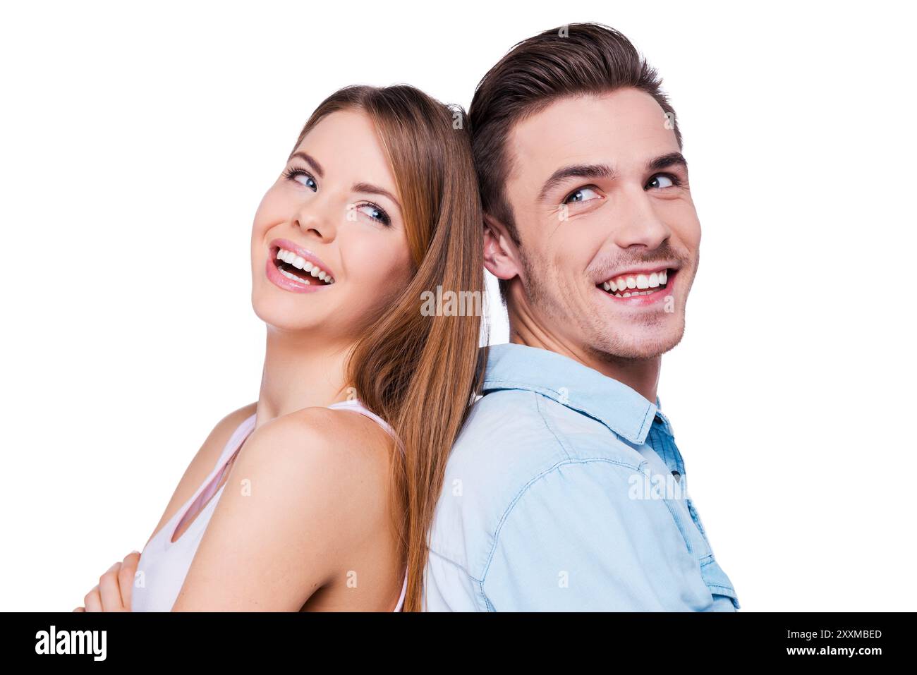 Happy to be together. Beautiful young loving couple smiling and ...