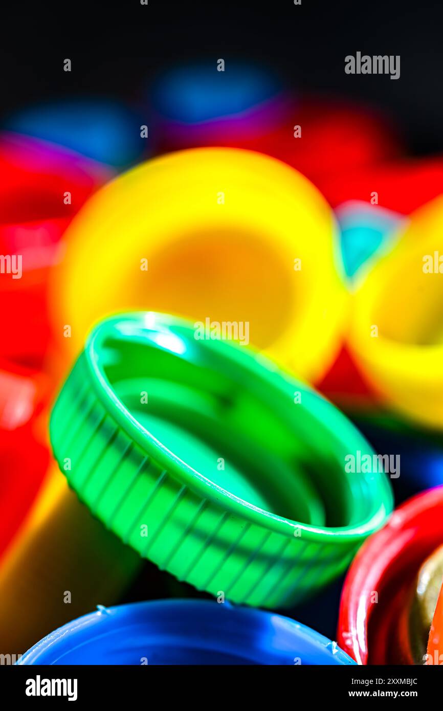 Different sorts of colorful plastic bottle caps. Recycling Stock Photo ...