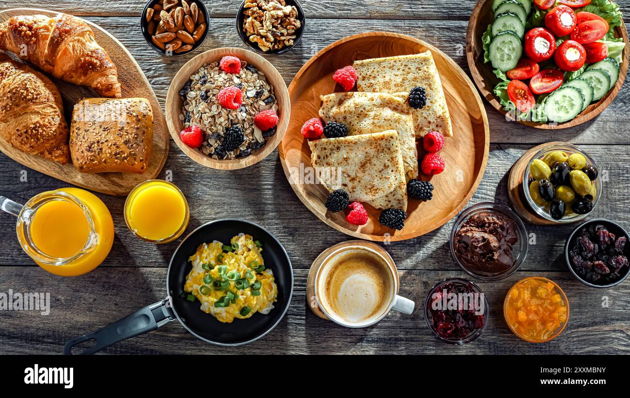 Breakfast served with coffee, orange juice, croissants, cereals ...