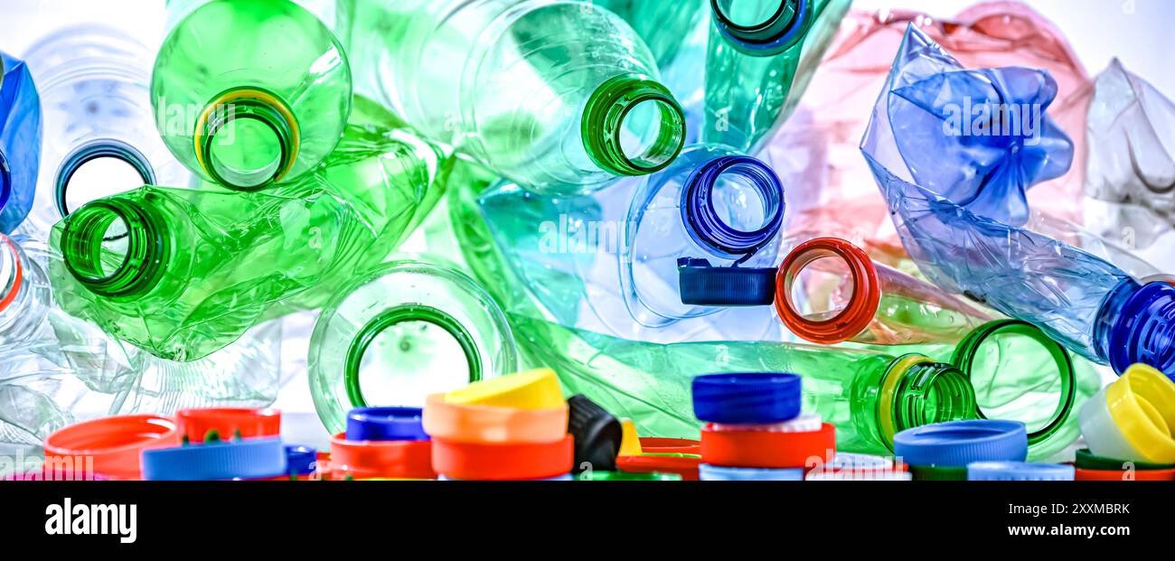 Empty colored drink bottles. Recyclable plastic waste Stock Photo - Alamy