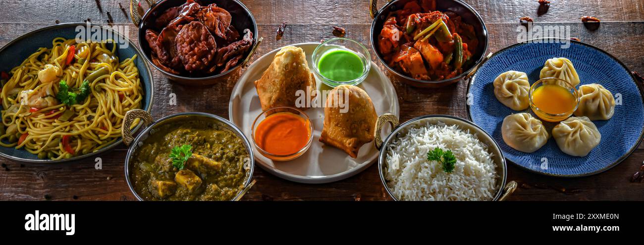 Composition with indian dishes: samosa, pakora, palak paneer, jalfrezi ...