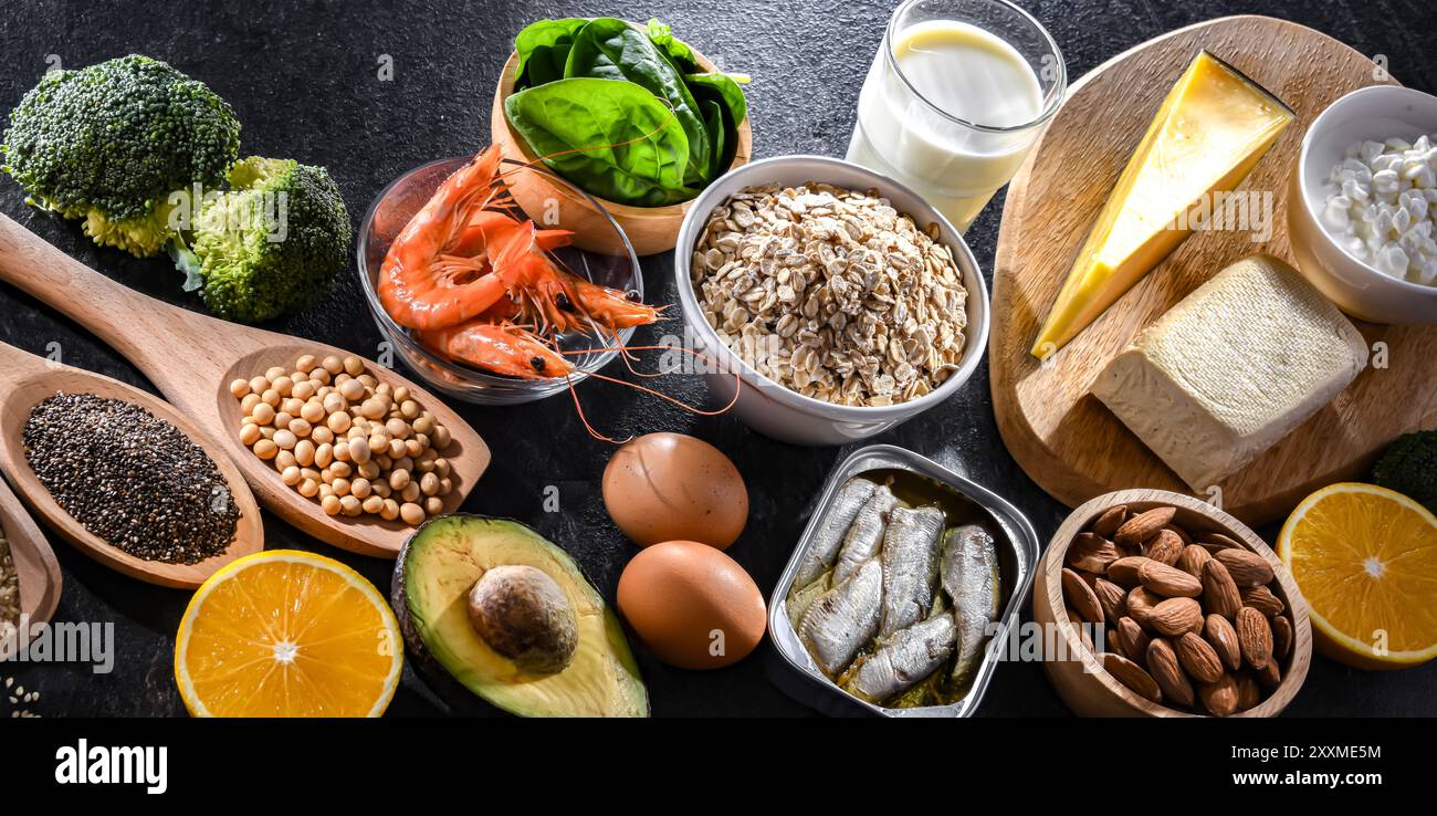 Composition with food products rich in calcium Stock Photo - Alamy