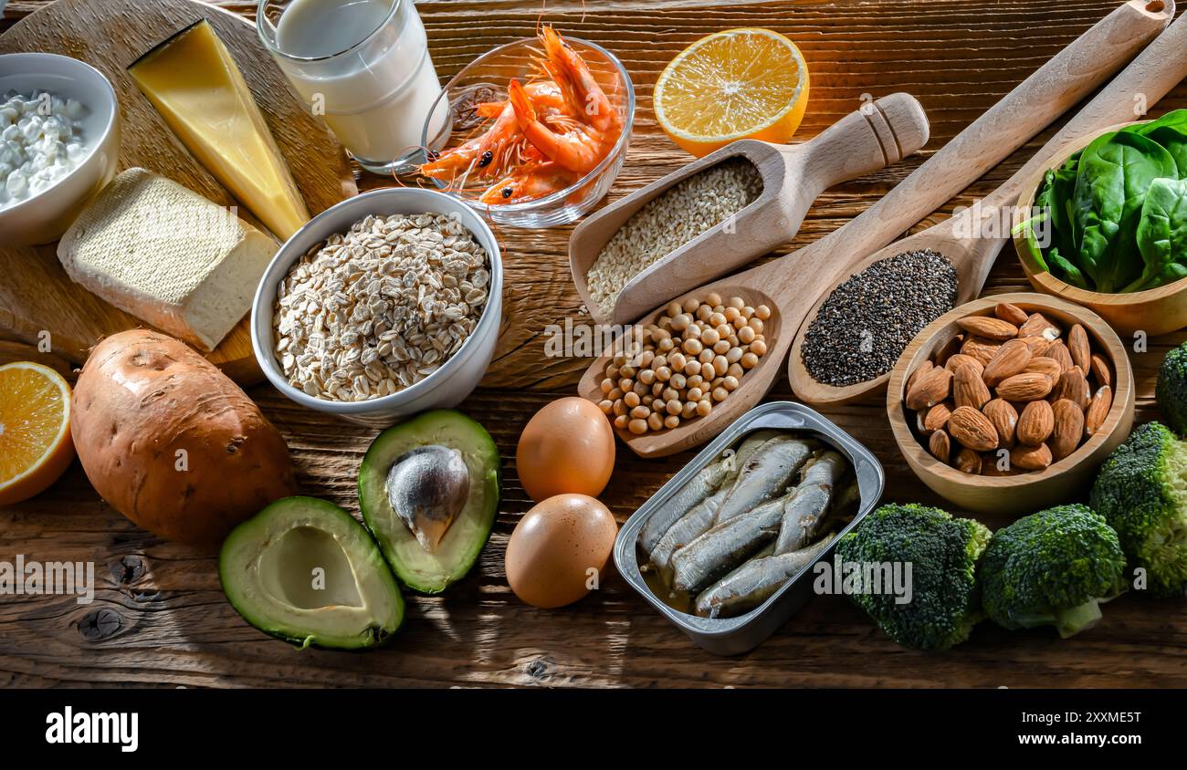 Composition with food products rich in calcium Stock Photo - Alamy