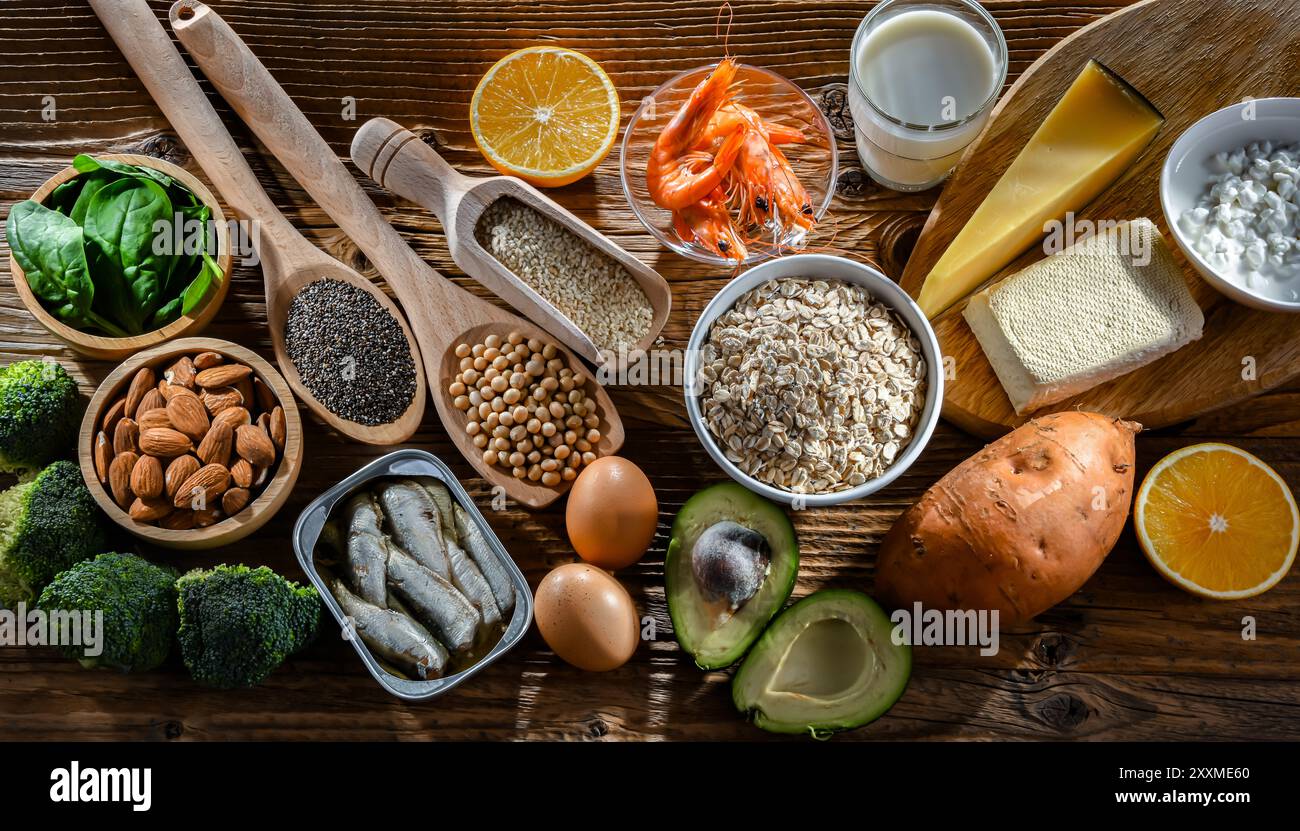 Composition with food products rich in calcium Stock Photo - Alamy