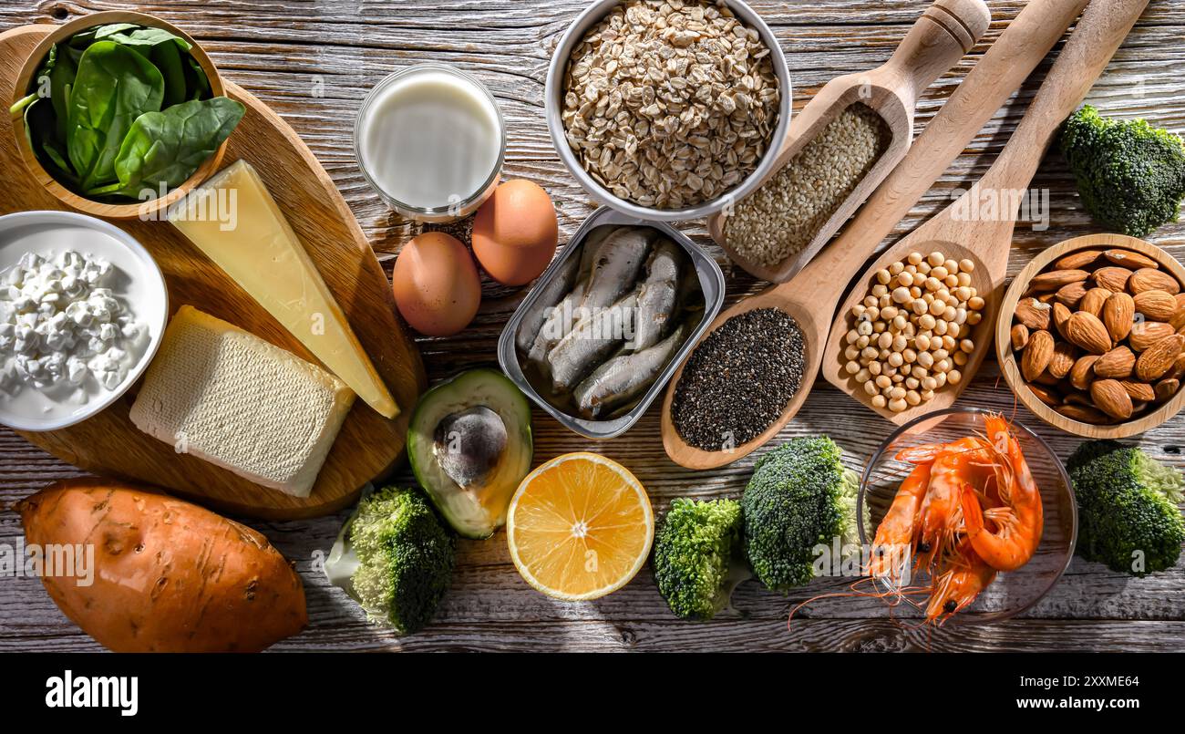 Composition with food products rich in calcium Stock Photo - Alamy