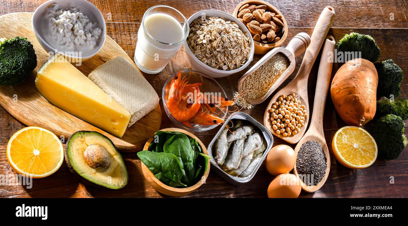 Composition with food products rich in calcium Stock Photo - Alamy