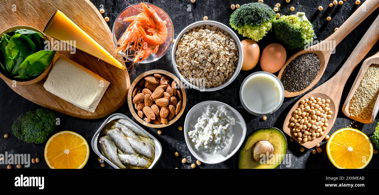 Composition with food products rich in calcium Stock Photo - Alamy